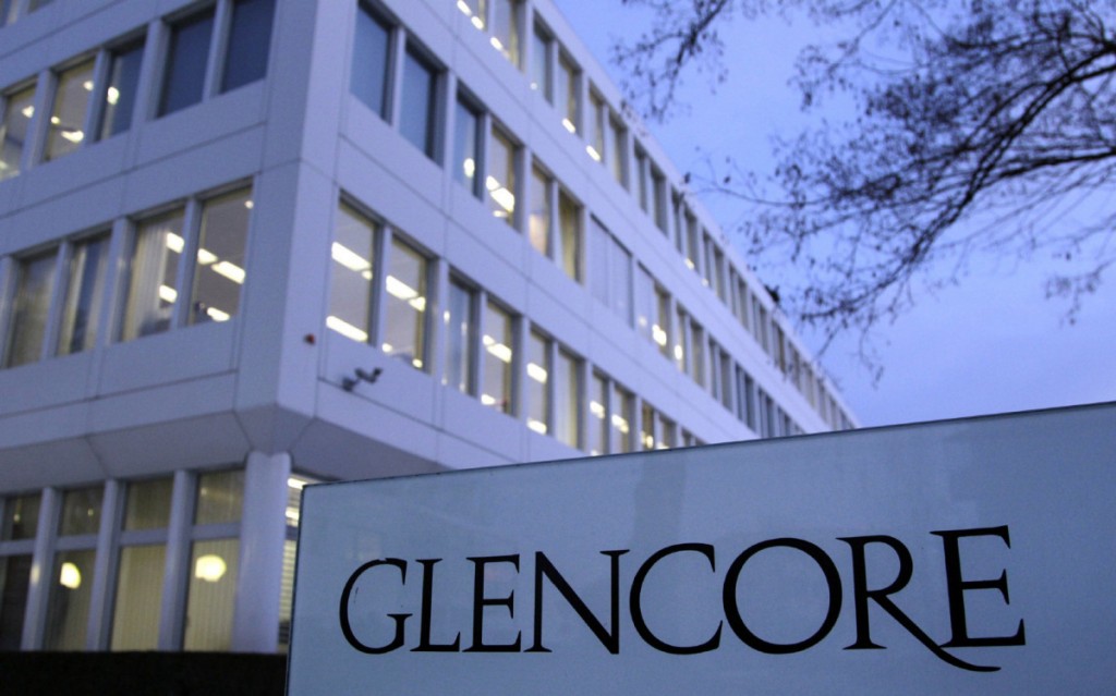 Glencore share price down, reports H1 loss, cuts trading guidance